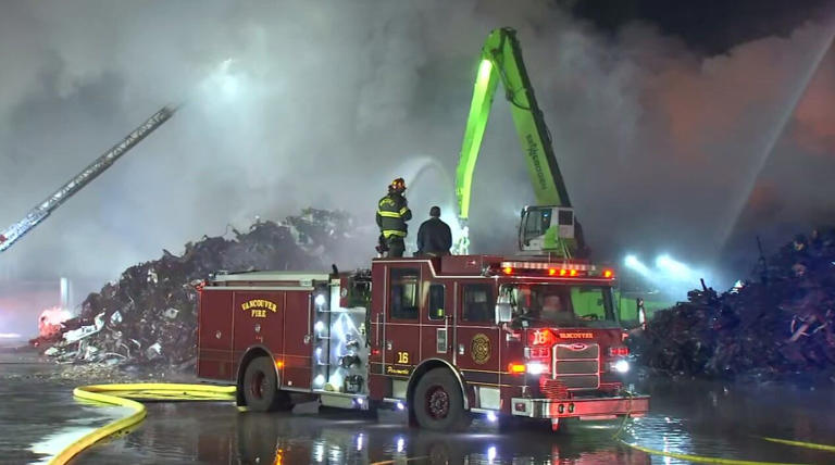 Firefighters battle massive fire at metal recycling plant in Vancouver