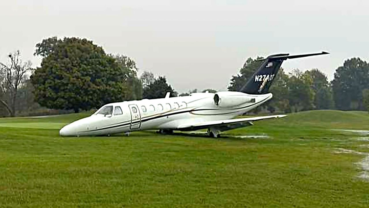 Cessna jet slides off runway and crashes onto Kentucky golf course