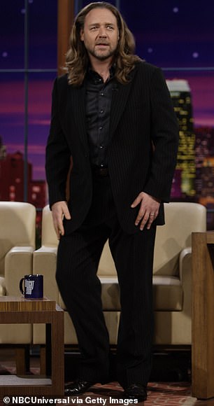 Can you guess who this is? Hollywood star's lookalike son steps out in ...