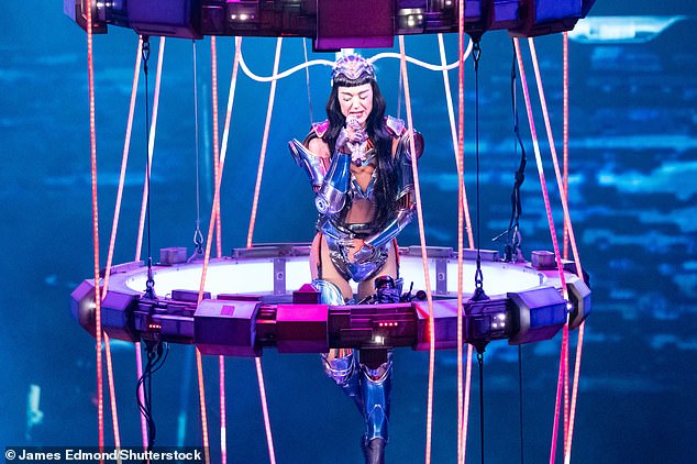 Katy Perry wraps up warm after touching down in Glasgow on UK and ...