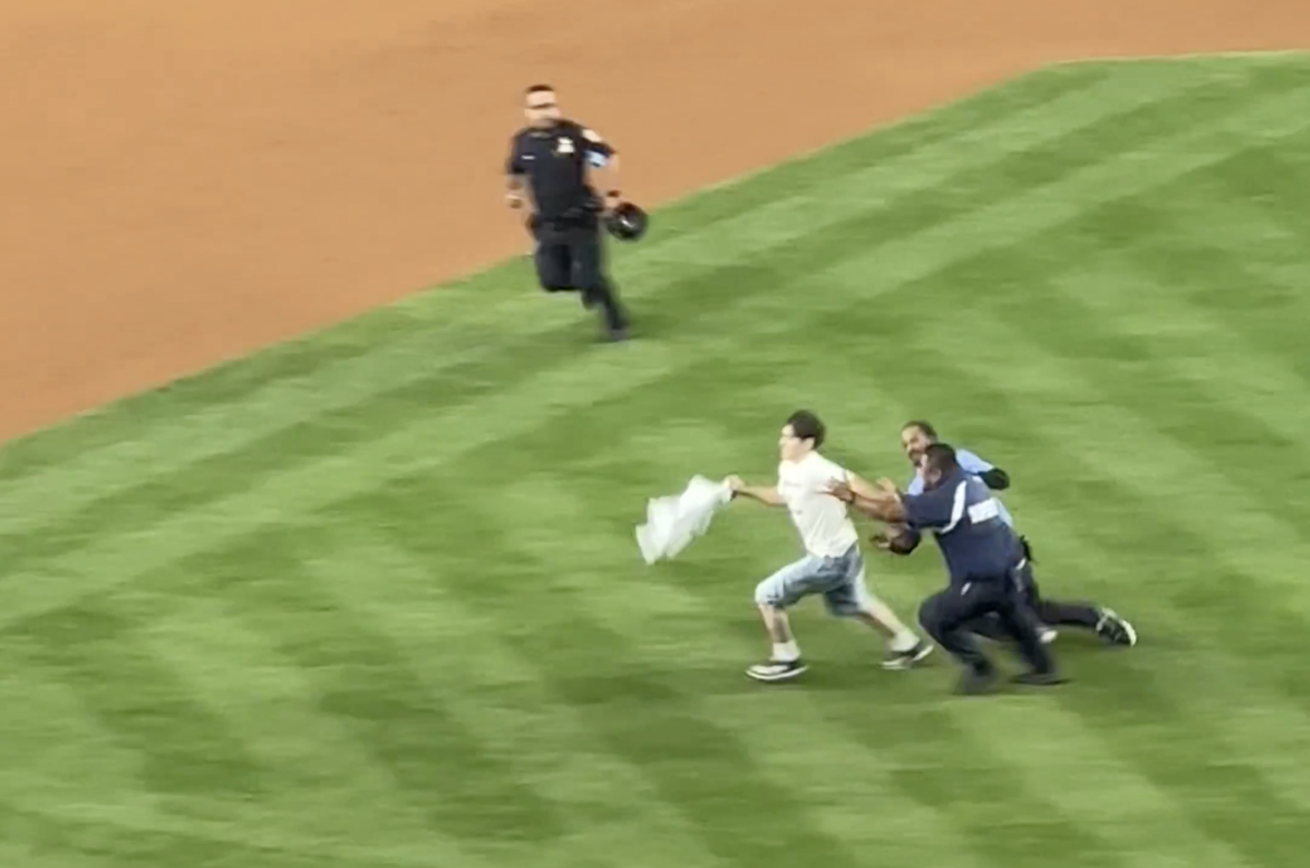 Yankees Fans Get Leveled After Storming Field During Game 3