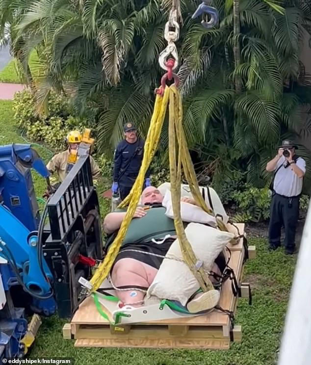 Crane needed to rescue 600-pound man on a shipping pallet from his ...