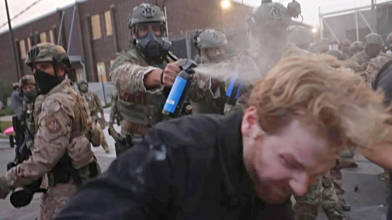 So much for Christian values’: ICE agent caught firing a pepper ball on ...