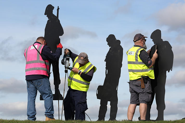 "Poignant tribute" with volunteers helping to install 1,475 silhouettes ...