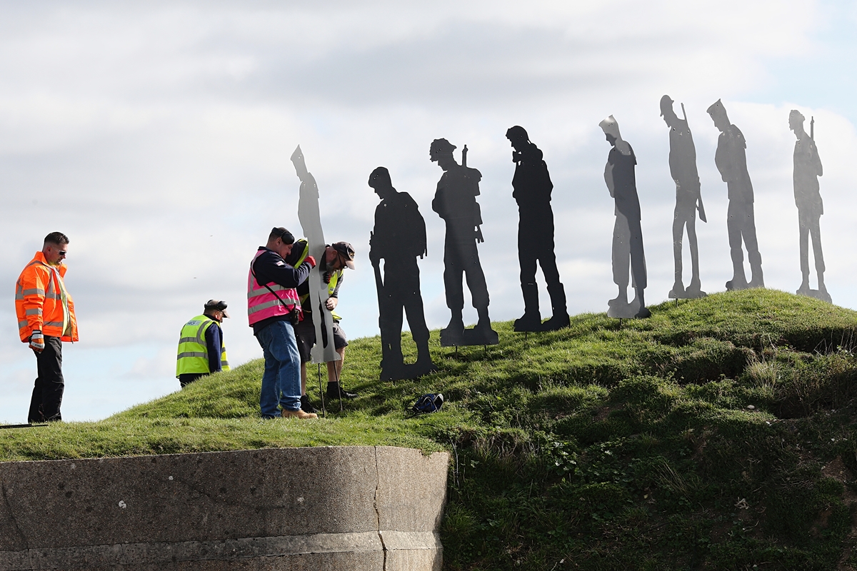 "Poignant tribute" with volunteers helping to install 1,475 silhouettes ...