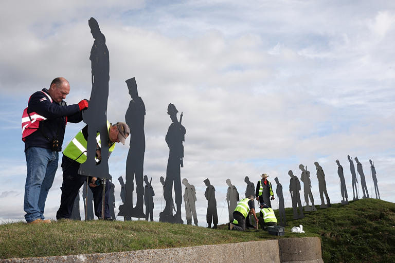 "Poignant tribute" with volunteers helping to install 1,475 silhouettes ...