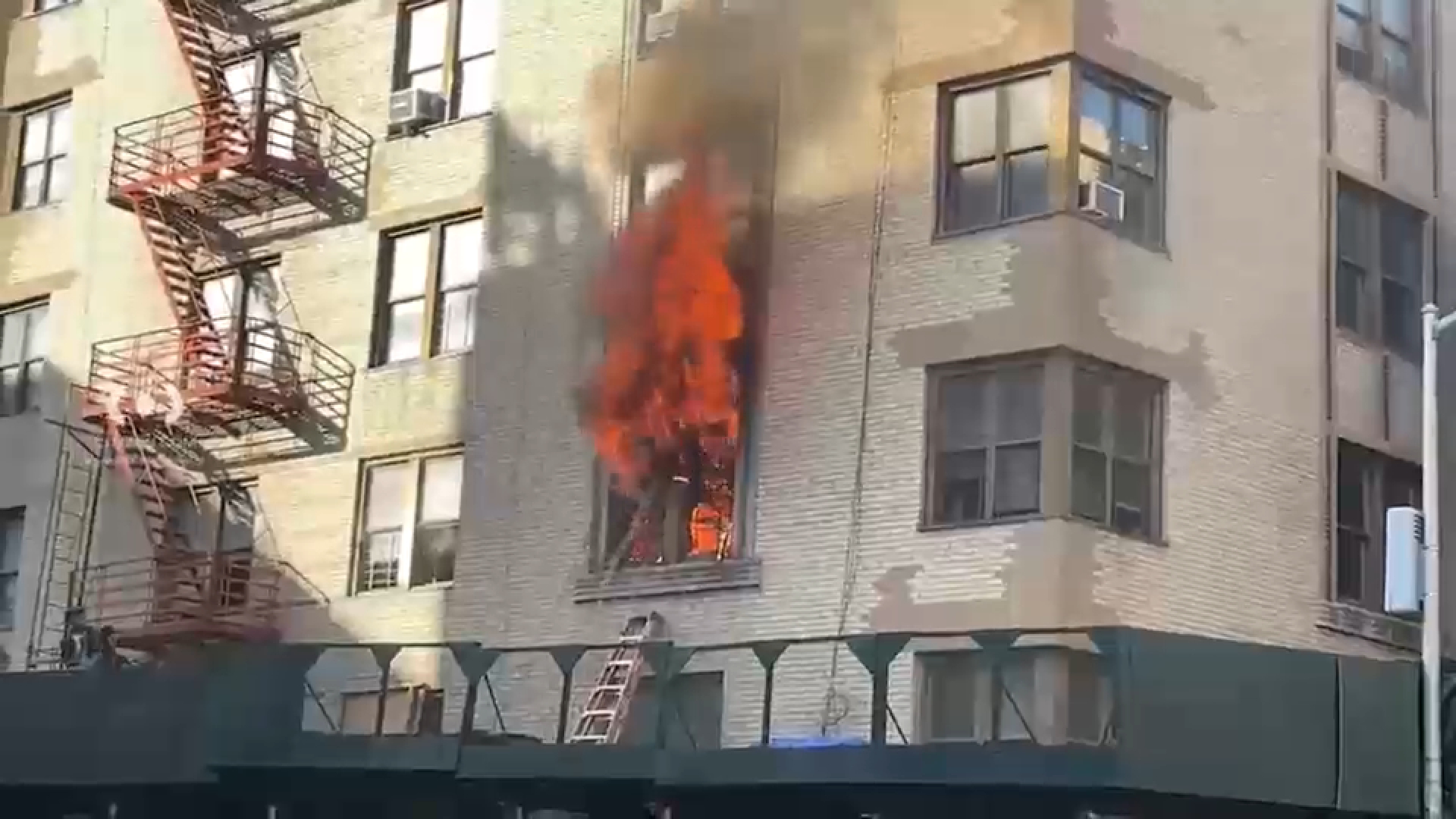 12 people injured, rescues made after fire breaks out at building in ...