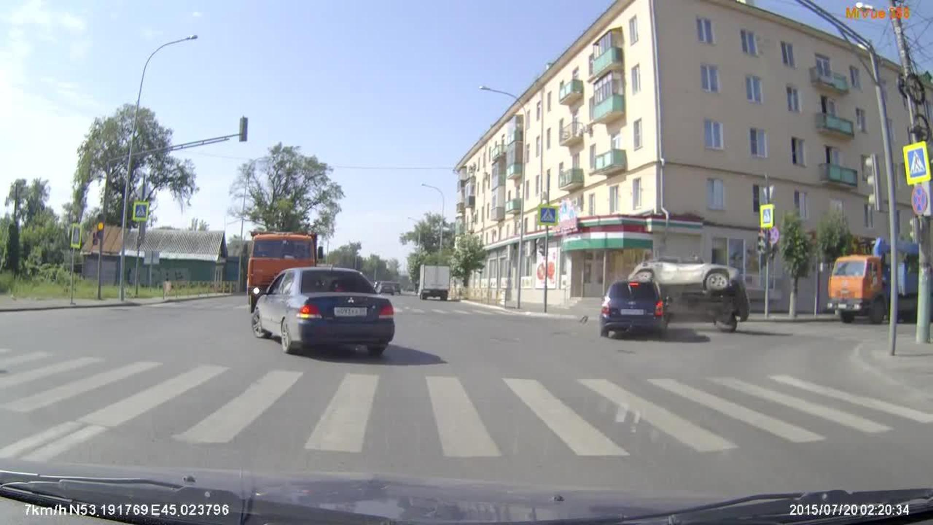 Car T-Bones Turning SUV Causing it to Flip Over