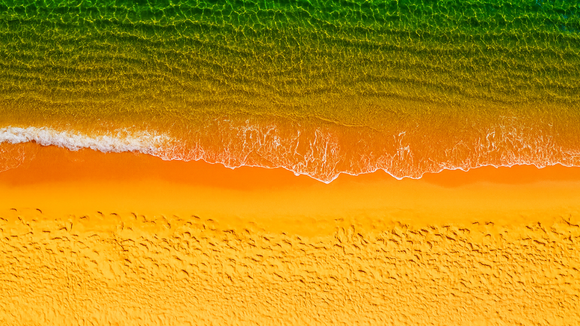 Golden Beach and Emerald Sea – Aerial View