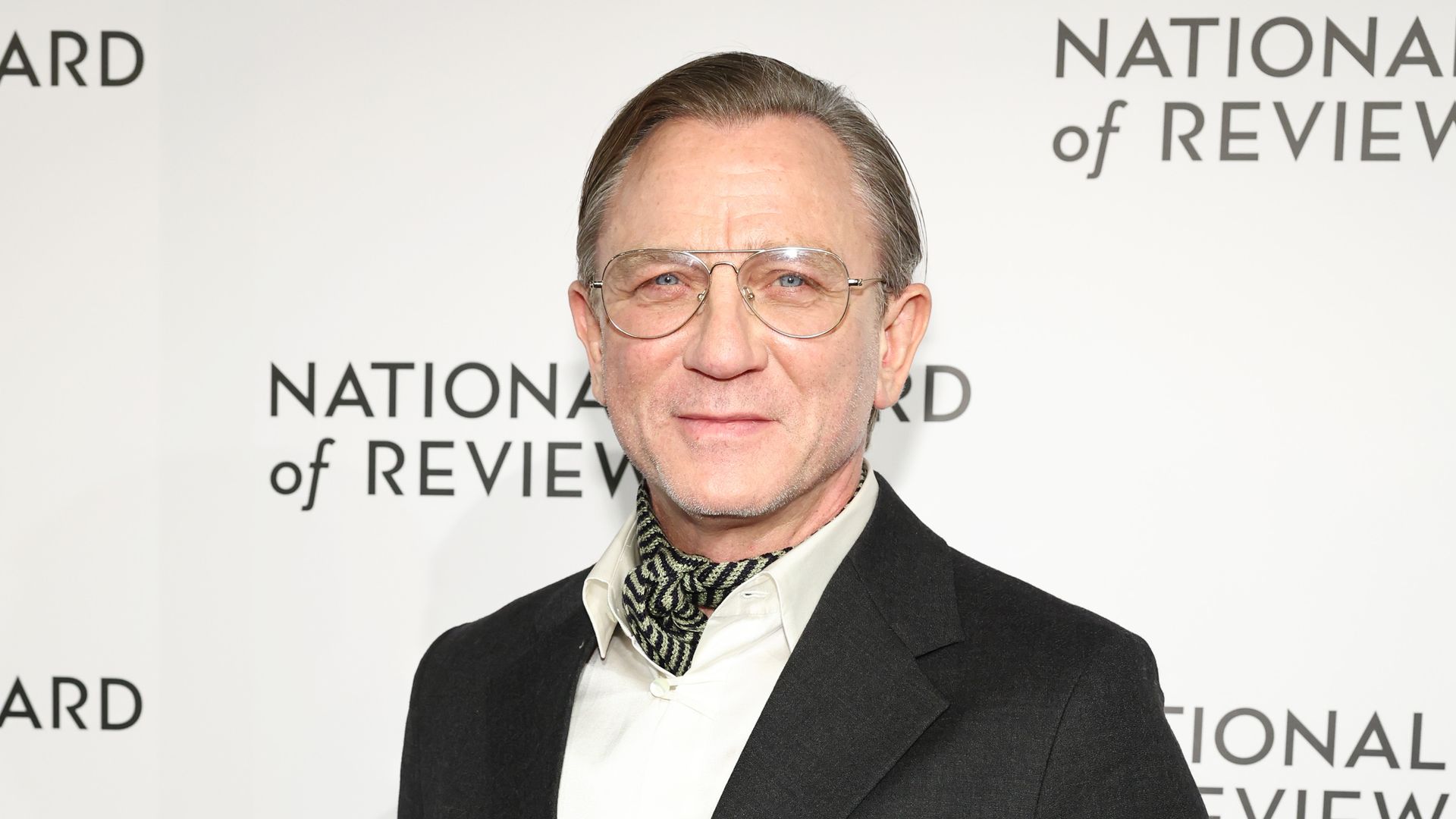 Daniel Craig unveils striking new hair transformation at star-studded ...