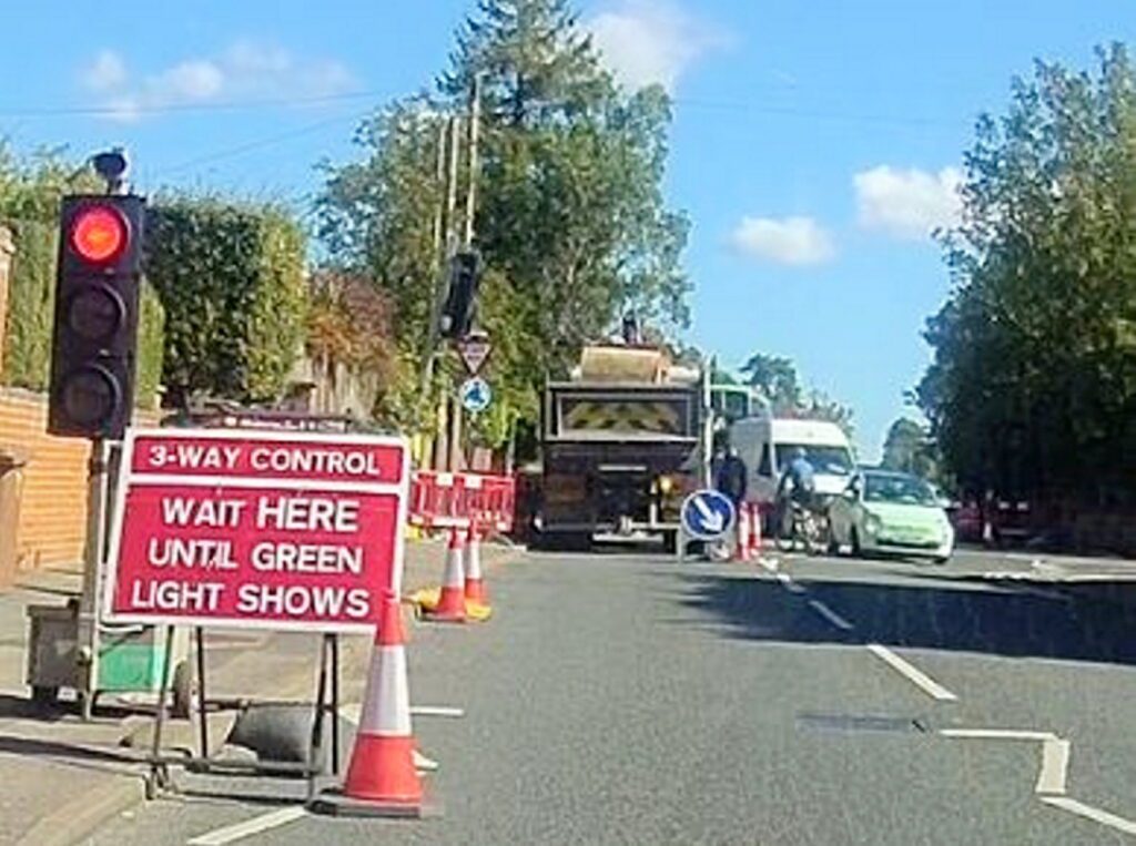 Cyclist gets instant karma after running red light – straight into path ...