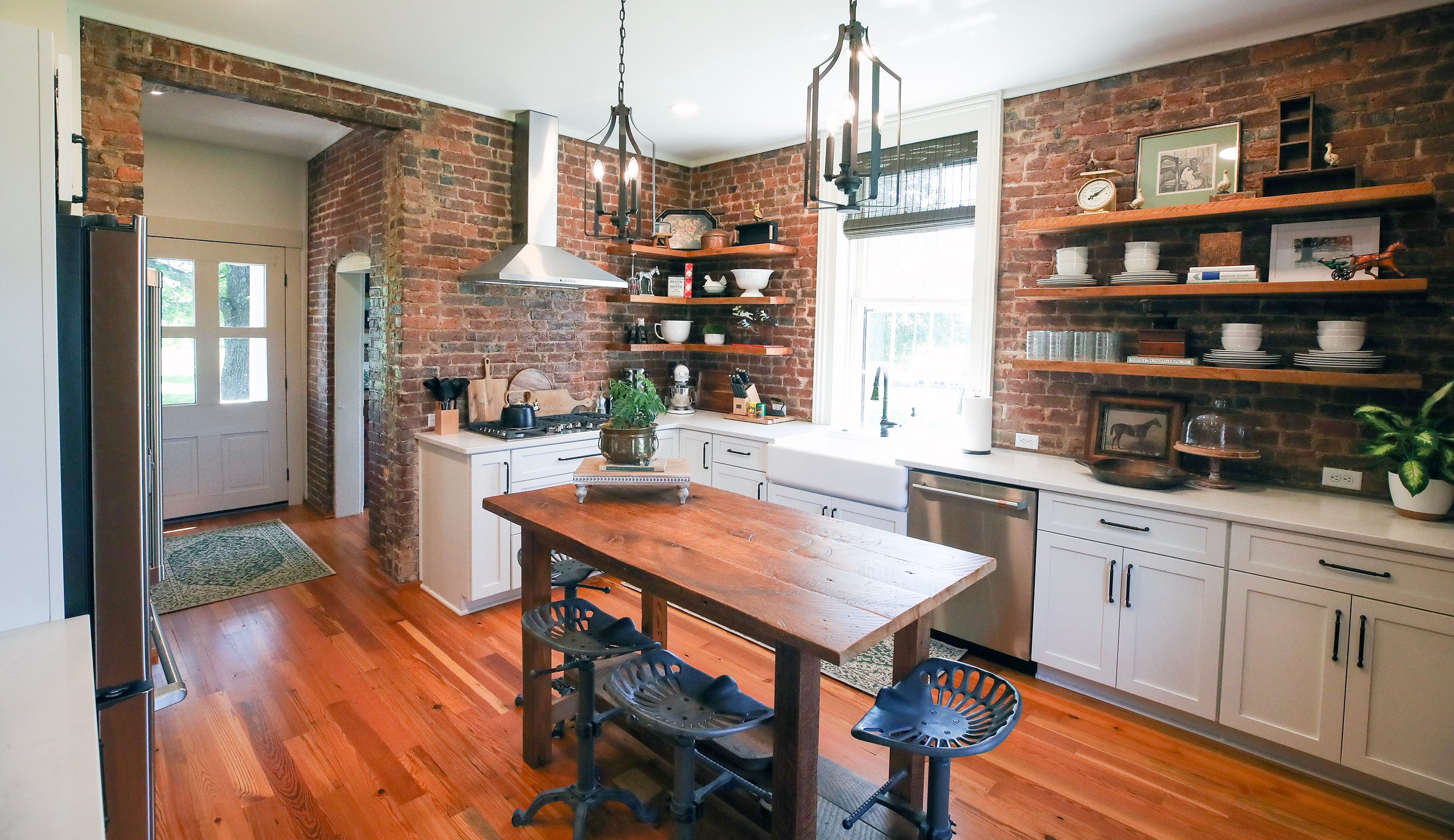 Explore 3 of our favorite Louisville homes with the beauty of exposed brick