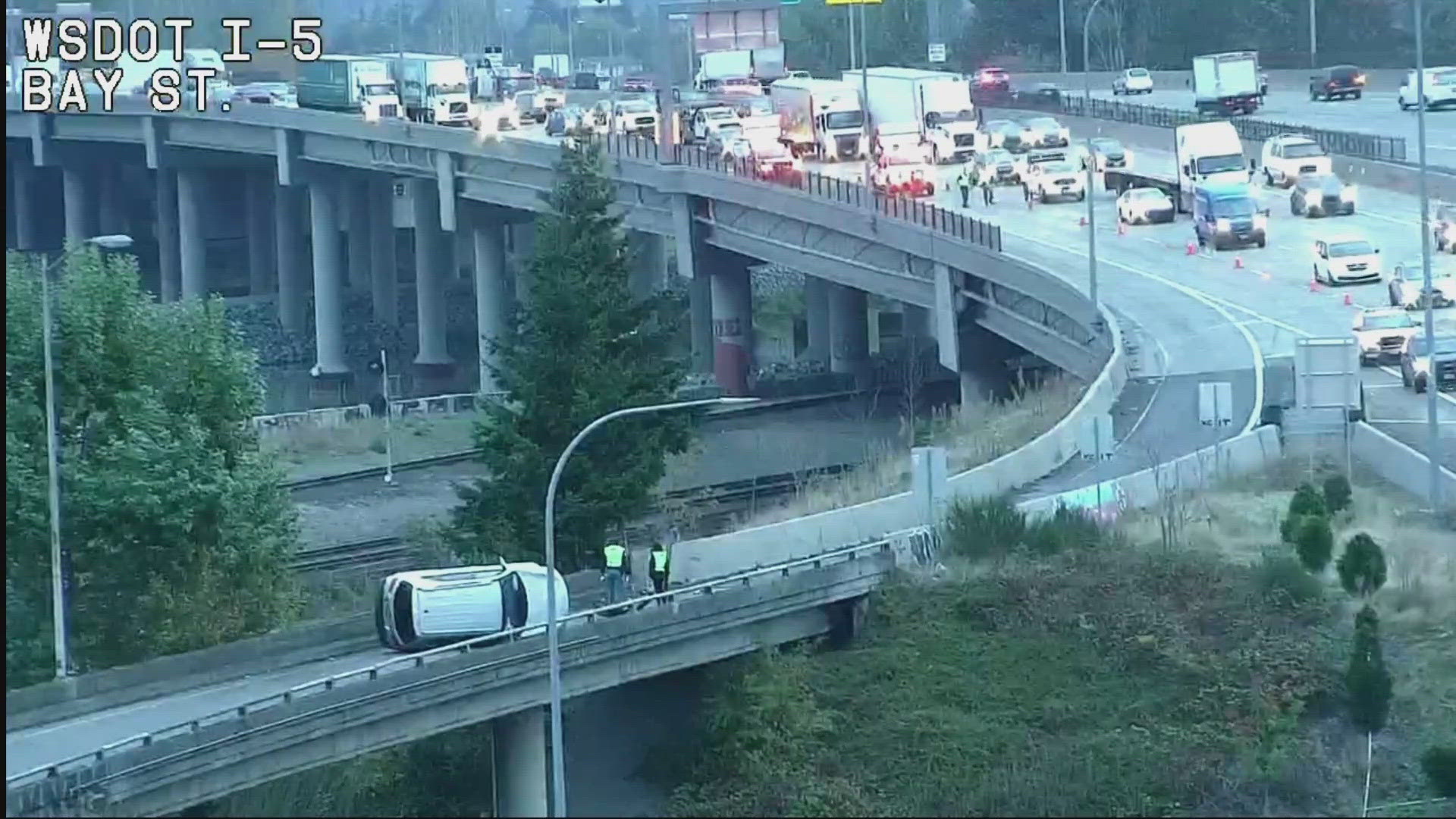 Vehicular assault leads to flipped car on I-5 offramp