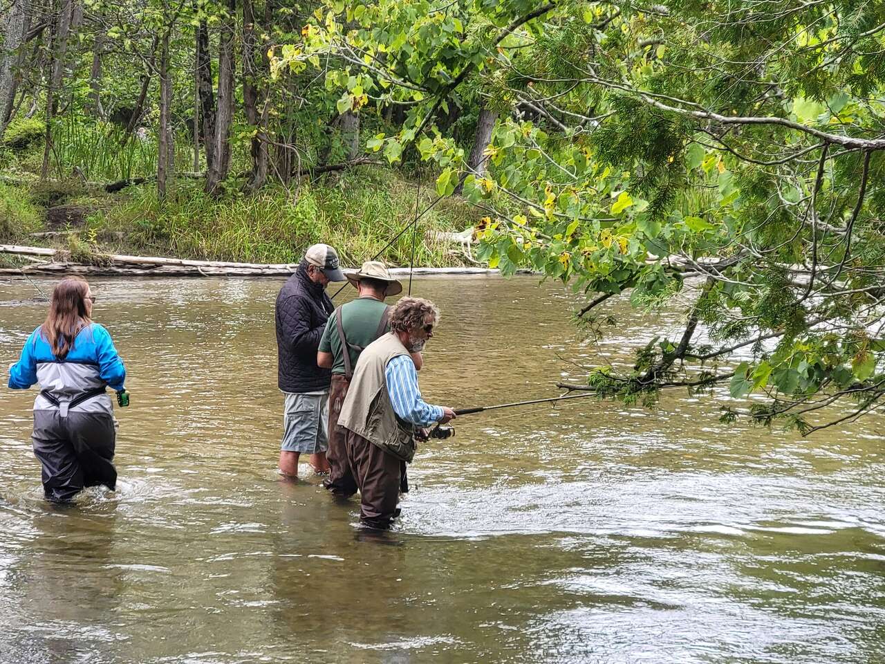 Anglers catching salmon in rivers, Lake Michigan fishing remains slow