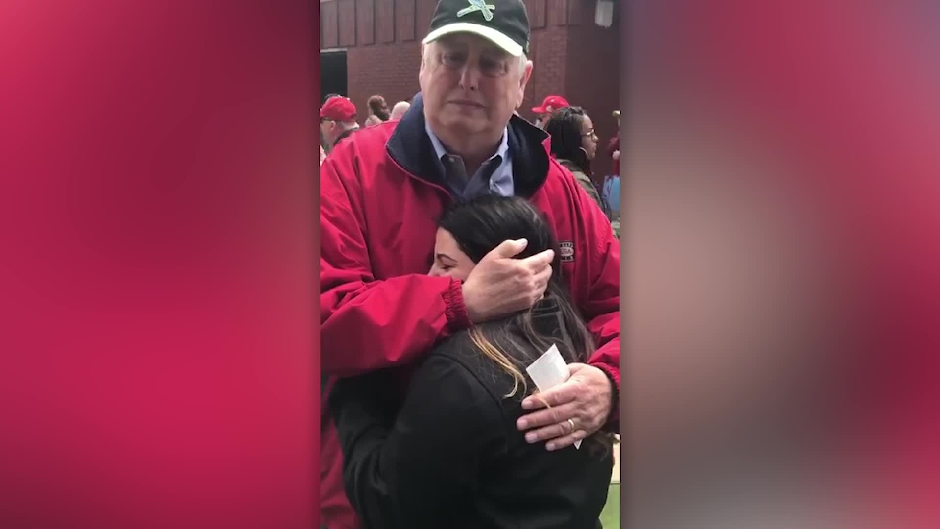 Family of donor listens to heartbeat in the chest of recipient