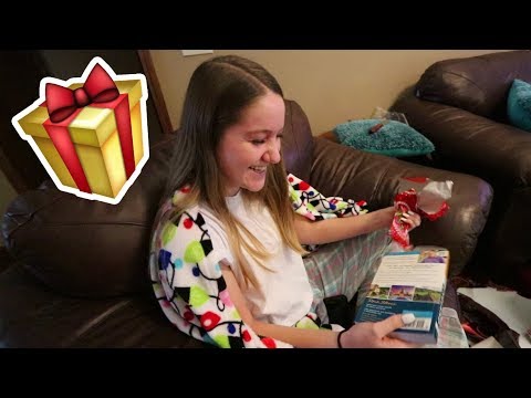 Opening Christmas presents with family on the big day