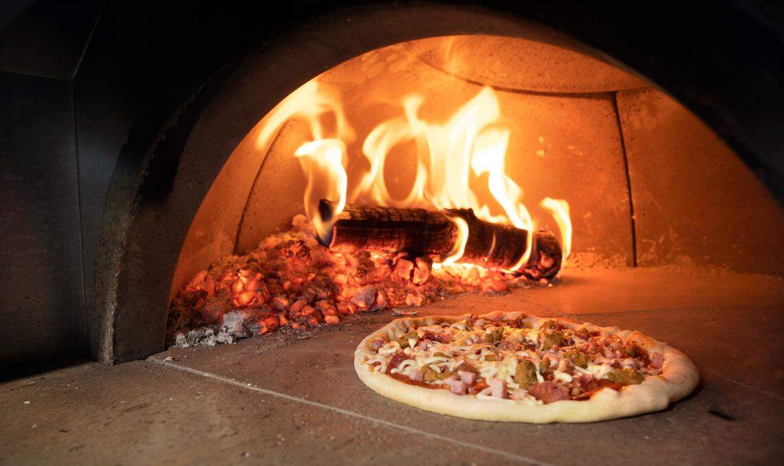 New drive-thru pizza restaurant known for funky flavors opens in Pierce ...