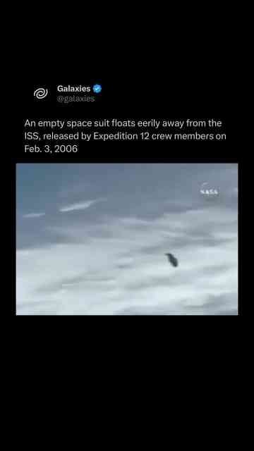 Empty space suit floating away in space