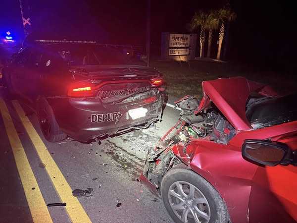 Deputy rear-ended at train crossing in distracted driving crash