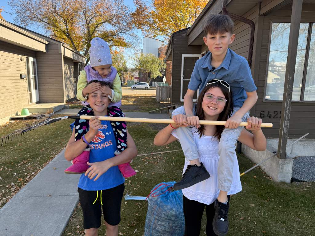 Edmonton students battle boredom with yard work during teacher strike