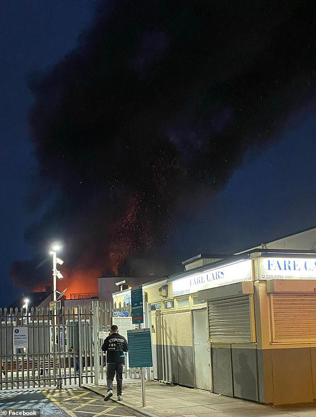 Travel chaos after massive blaze breaks out near London train station ...