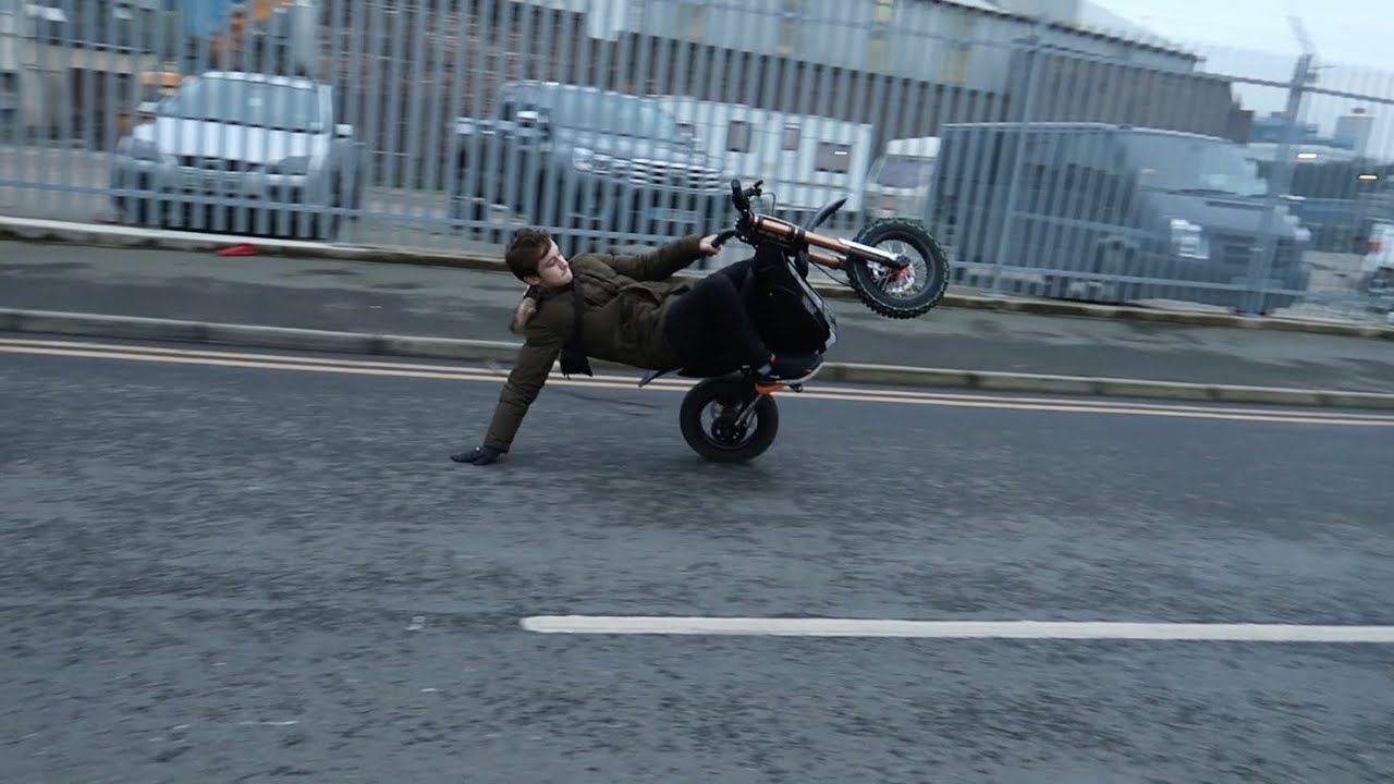 Insane electric dirtbike wheelies in urban areas