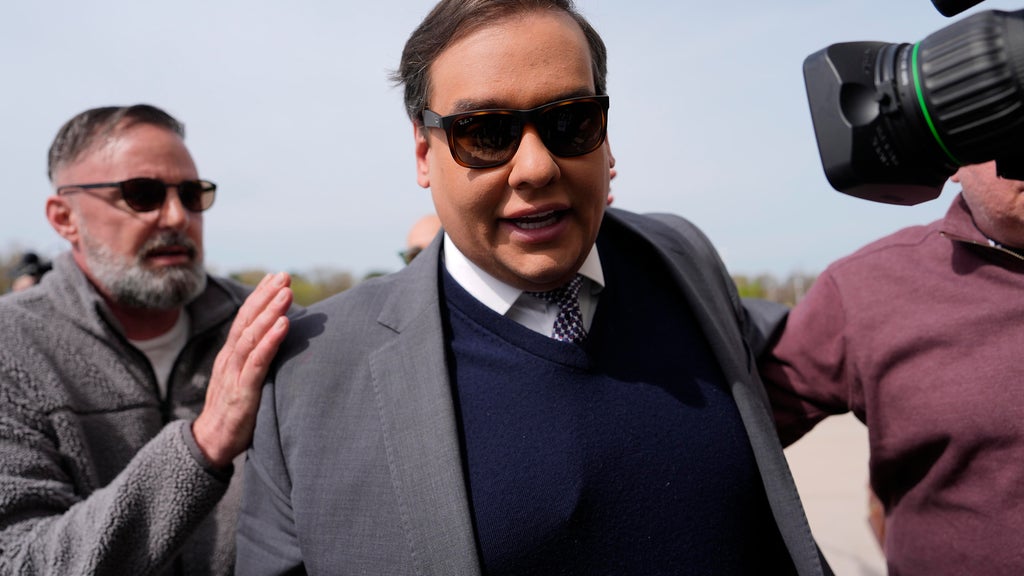 Trump commutes George Santos' prison sentence, says he will be released ...