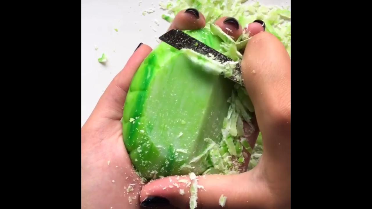 Green Bar Soap Scraping In Tiny Bits Soundly