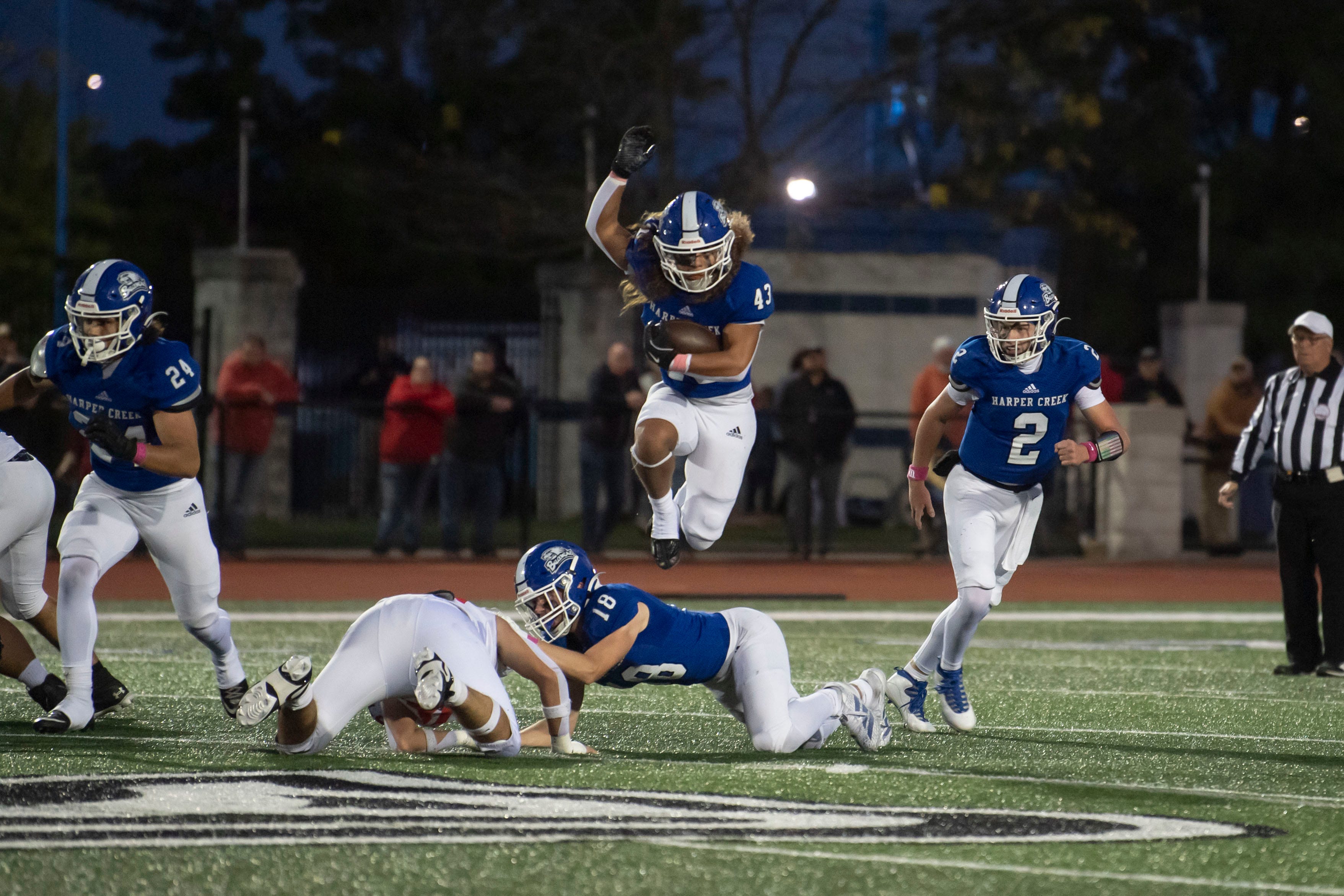Harper Creek football outlasts Marshall to win rivalry game, back-to ...