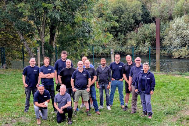 Company staff roll up their sleeves to help Worcestershire Sea Scouts