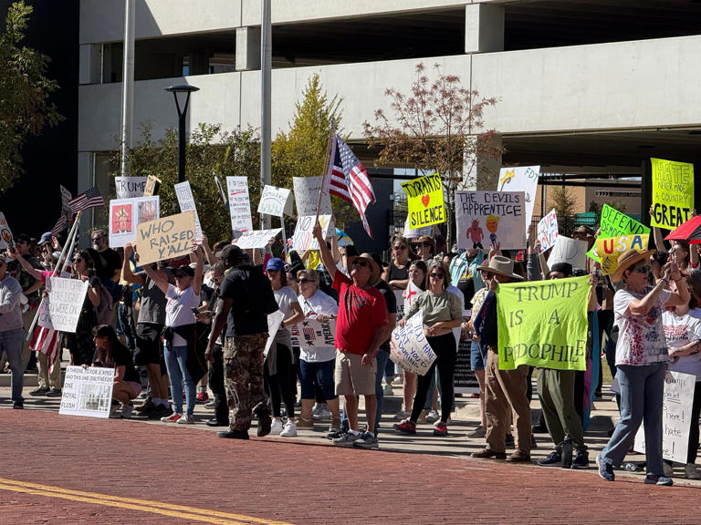 Protesters, counter-protesters gather in front of Citizens Tower in ...