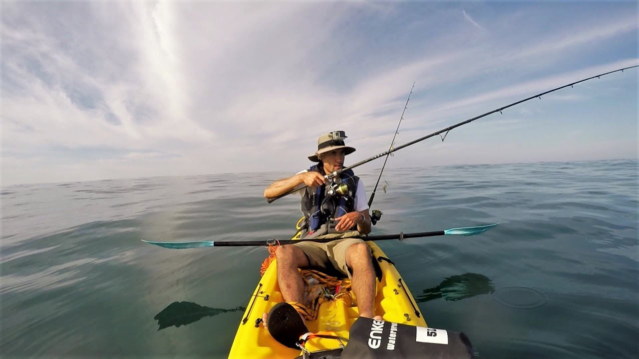 Kayak fishing catch and cook
