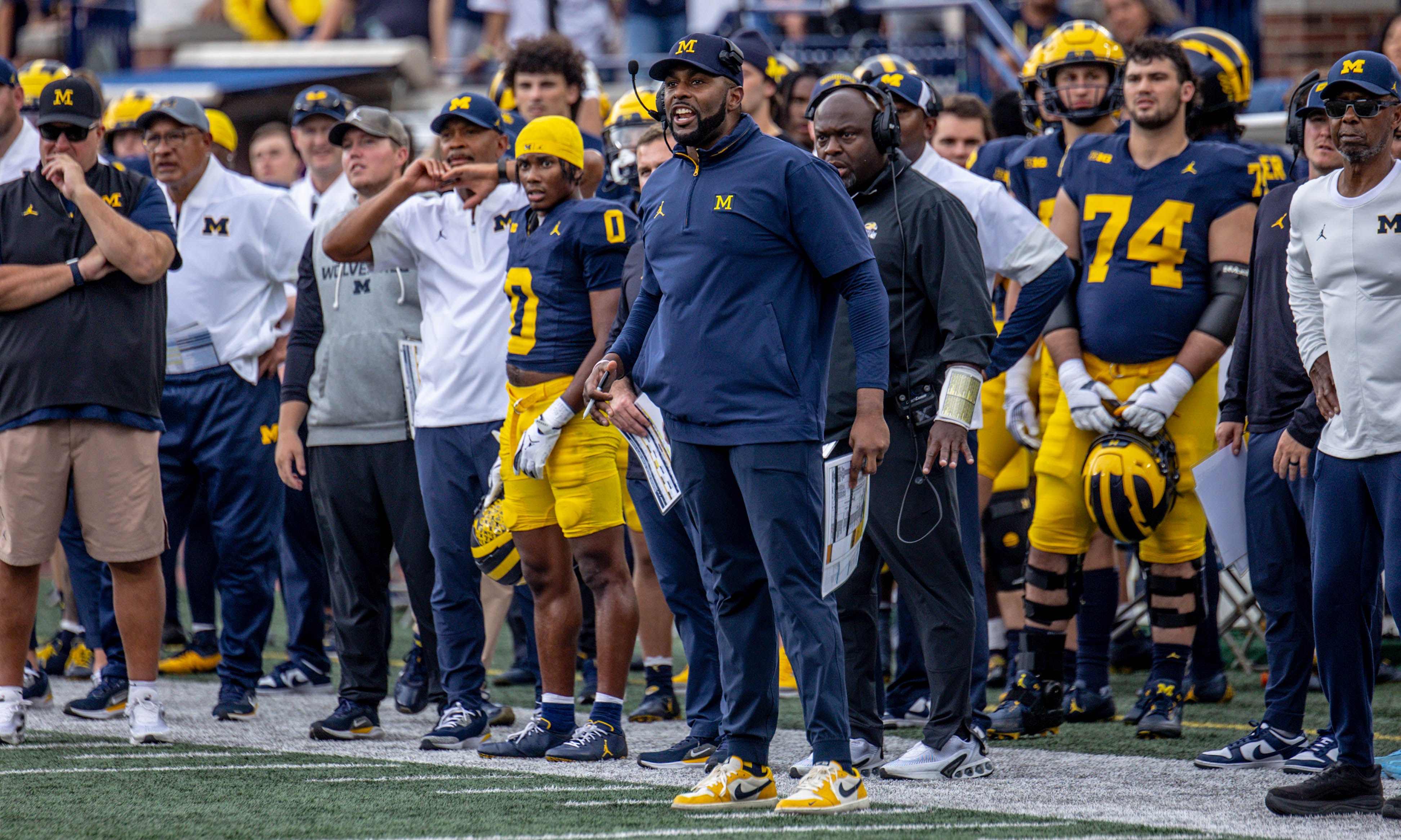 Michigan coaching fallout grows as Moore taken into custody