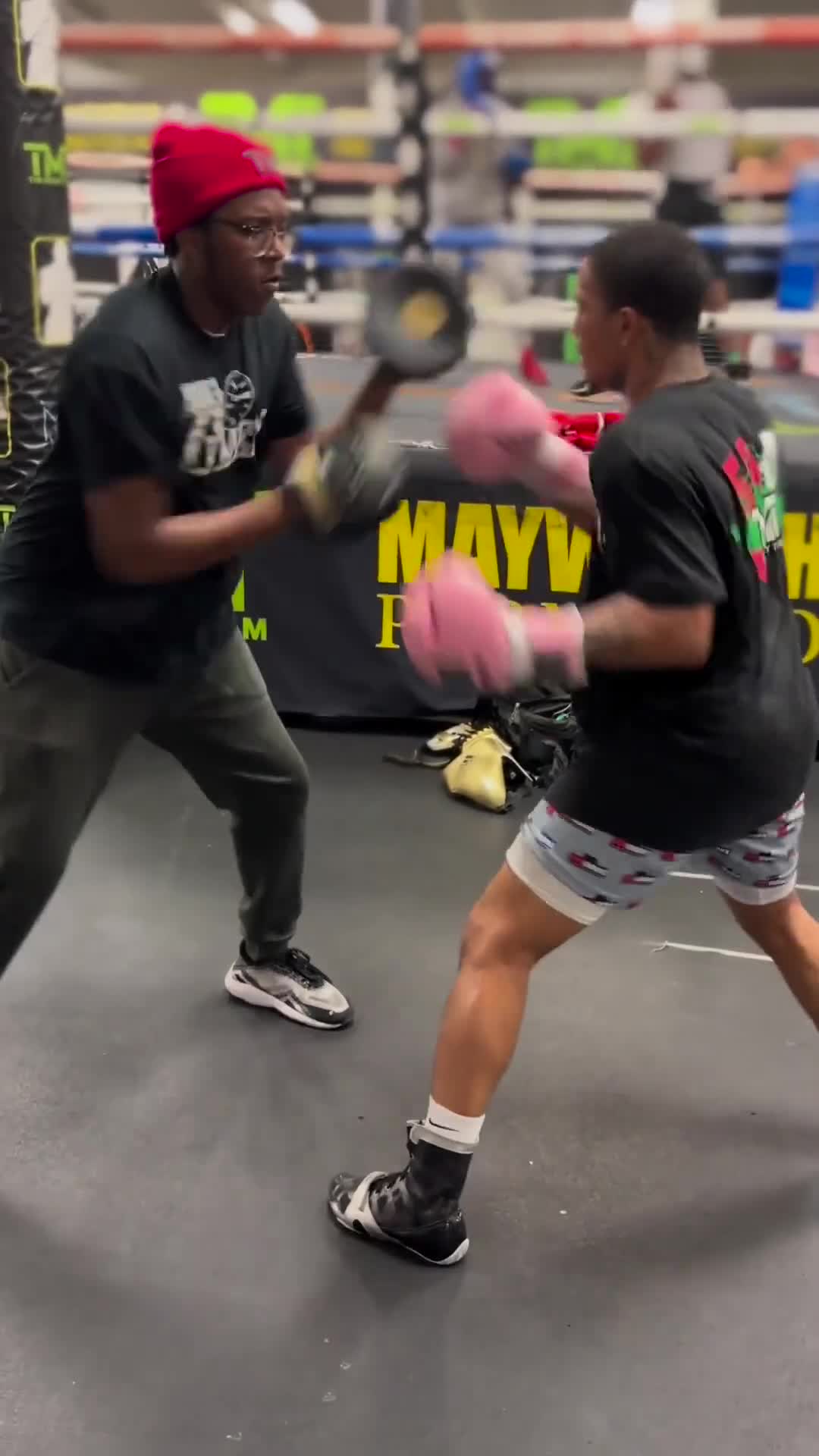 JHON INGRAM MAKING MUSIC DURING RAPID FIRE PAD DRILL AT MAYWEATHER GYM