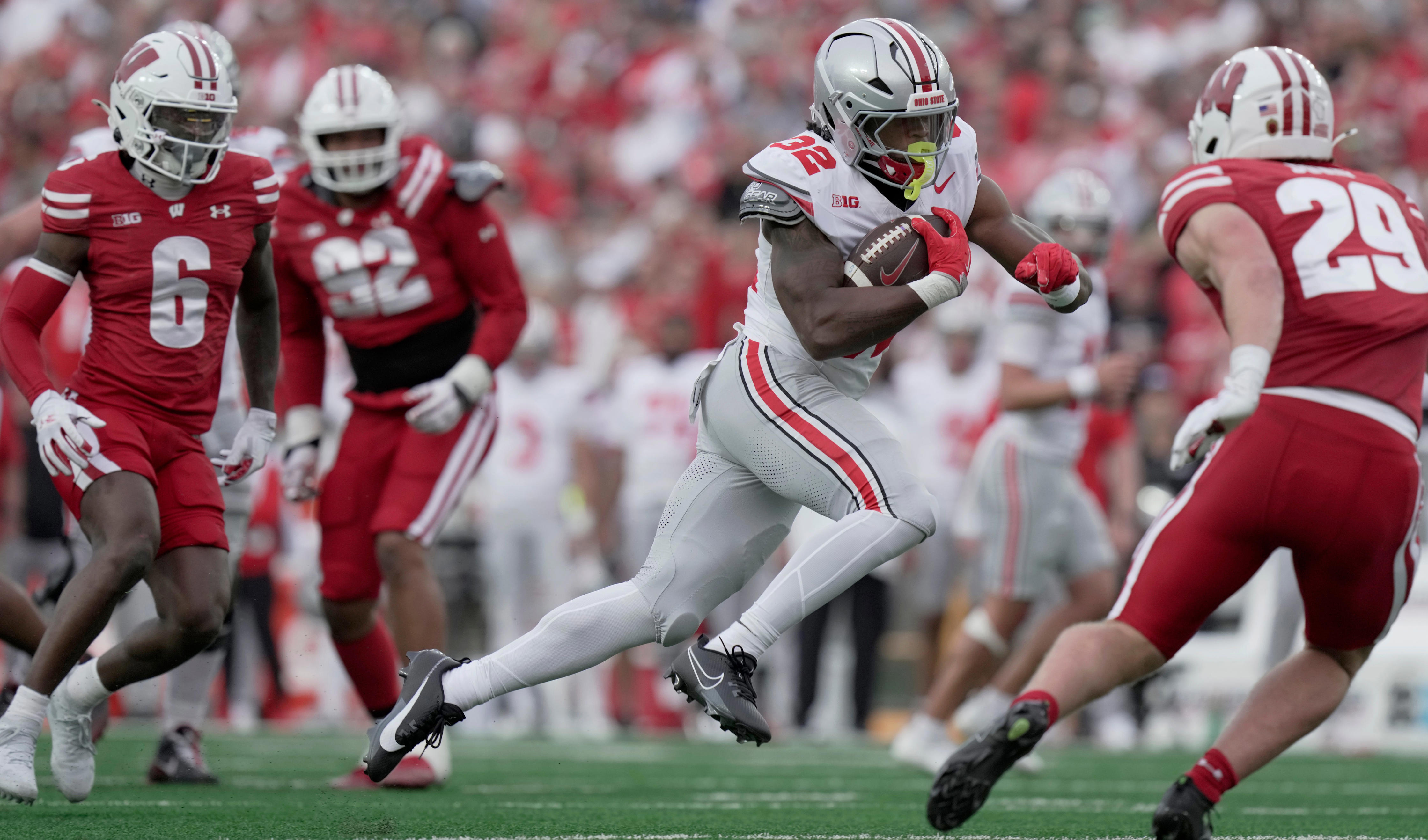 Badgers player broke his arm and stayed in game. Praising that isn't ...