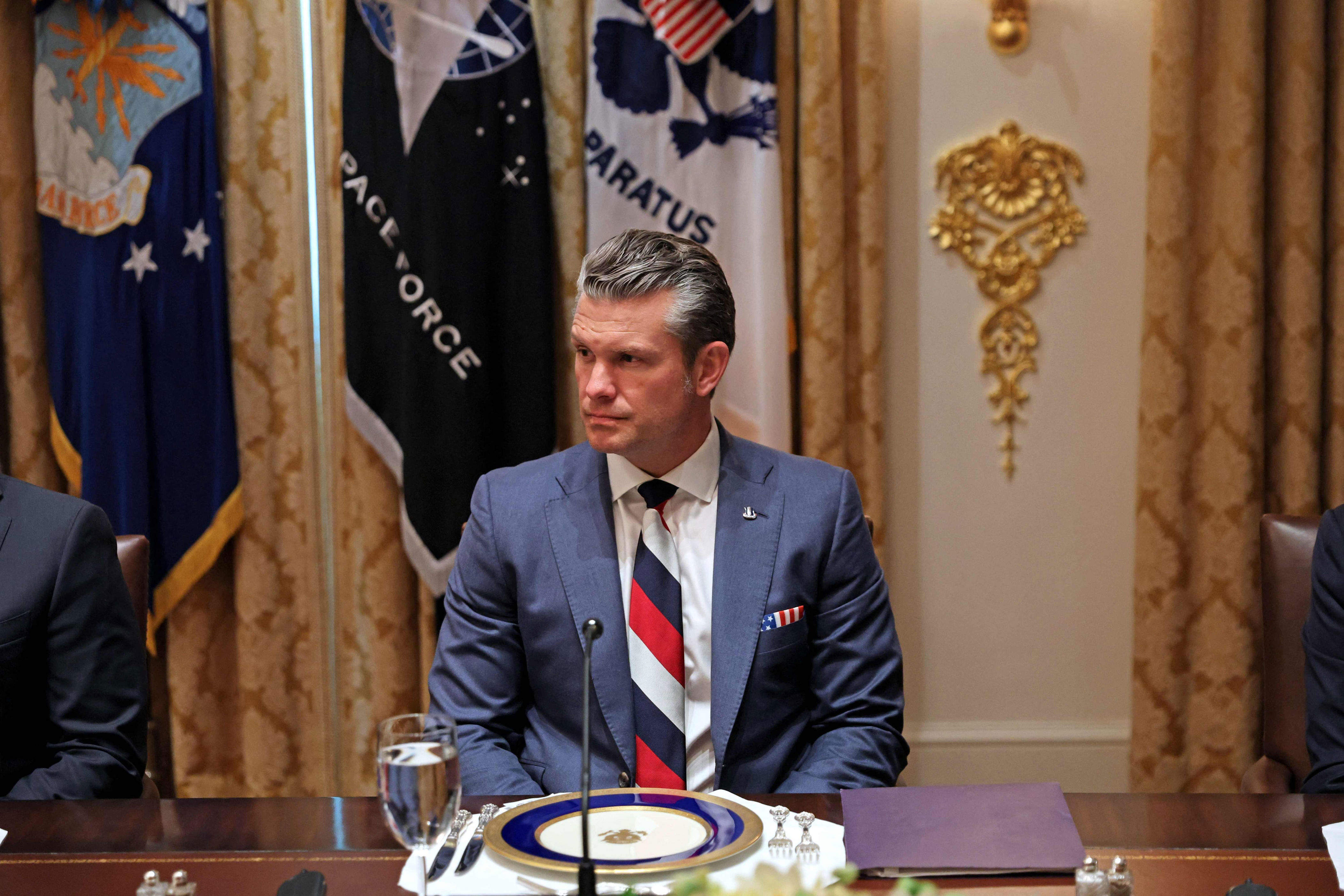 Hegseth's Russian-Flag Tie Sparks Controversy at Zelenskyy Summit