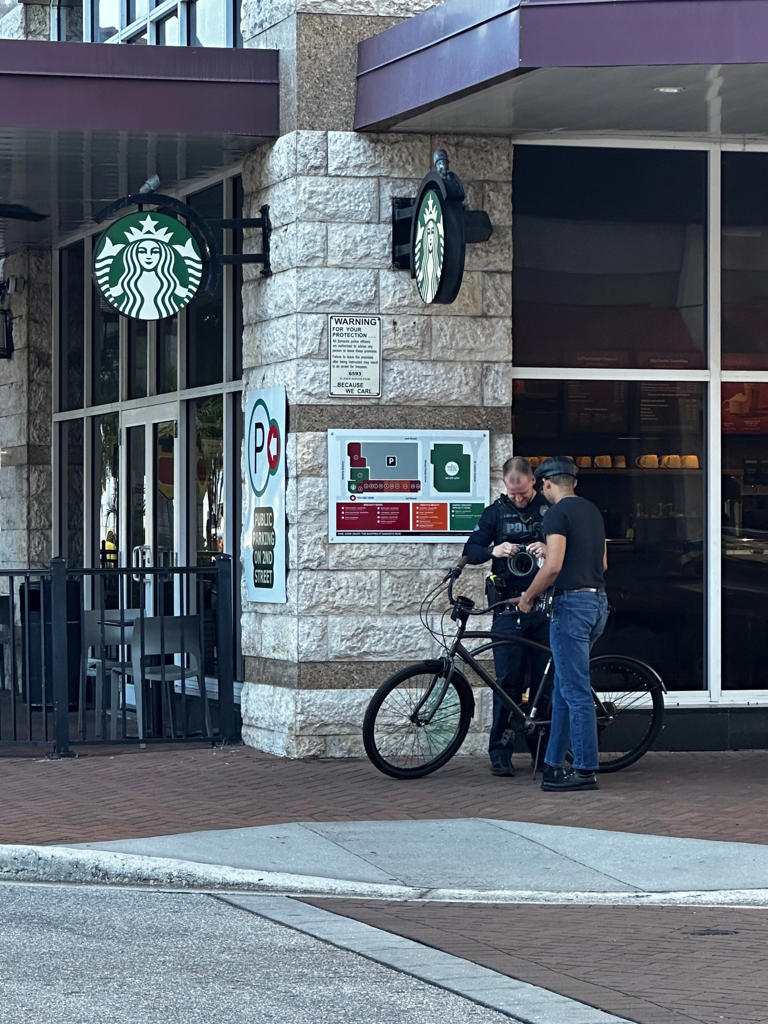 Sarasota officer surprises Starbucks barista with new bike