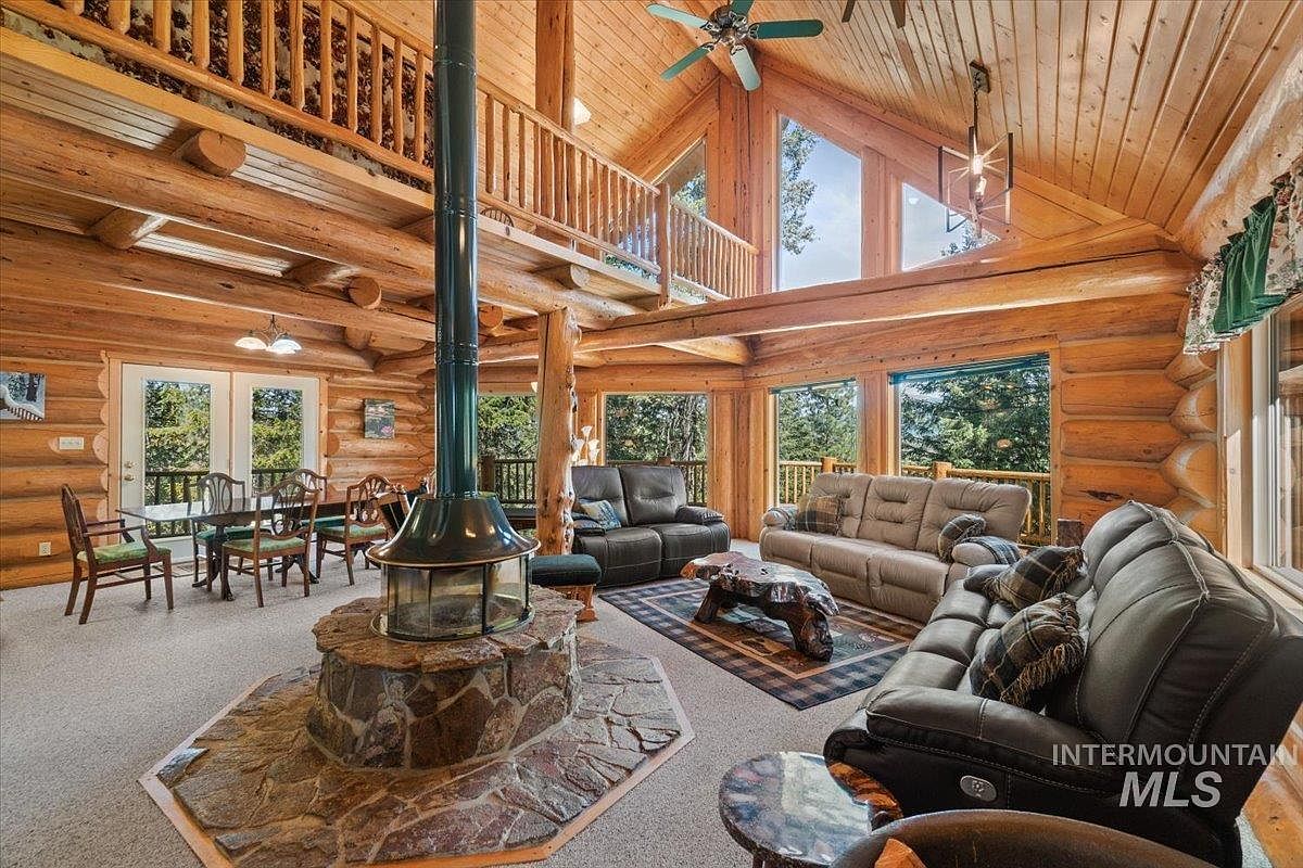 Spacious Log Home in Idaho on 8 Wooded Acres with Soaring Ceilings ...