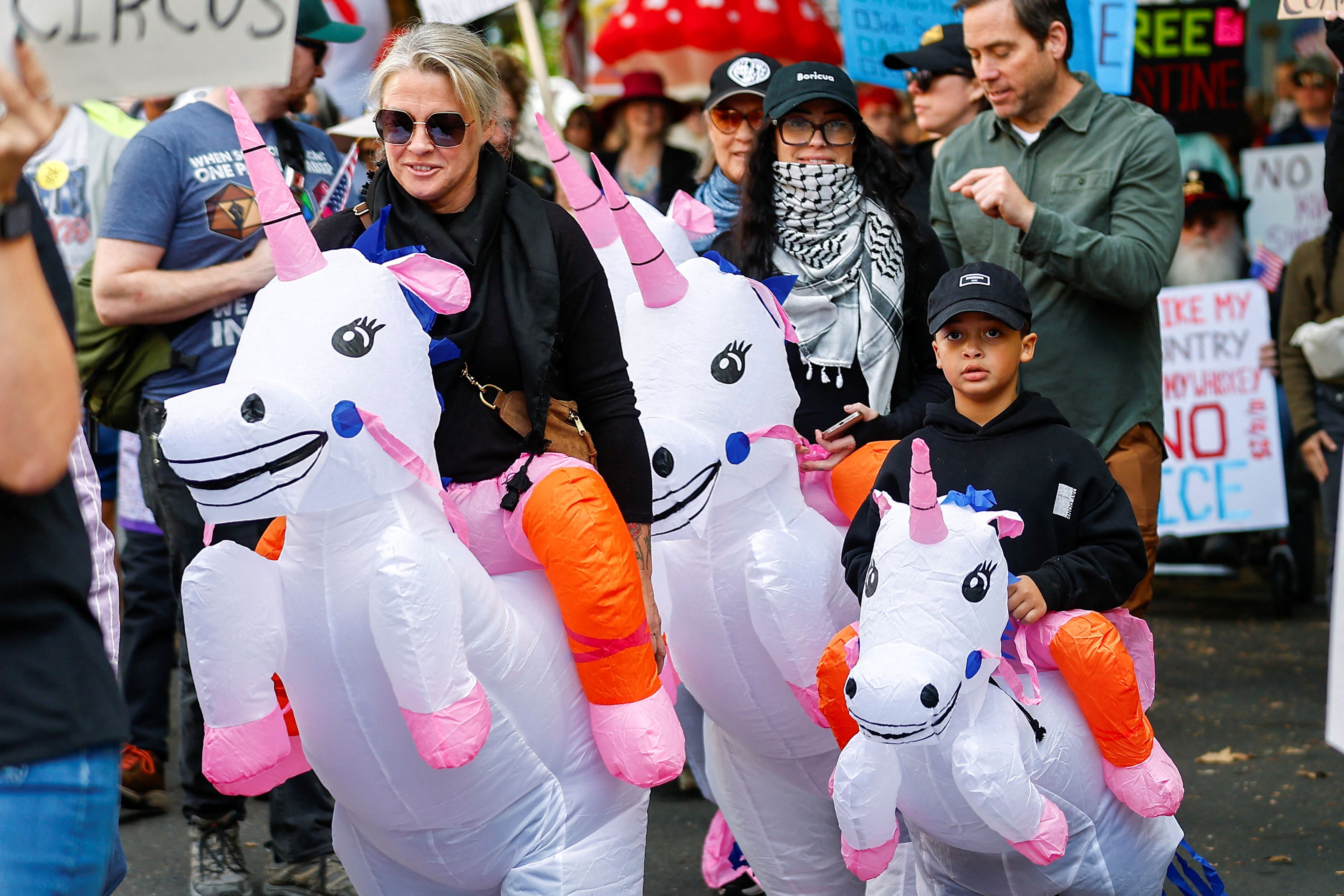 Why protesters against Trump are wearing frog, chicken and T. rex costumes