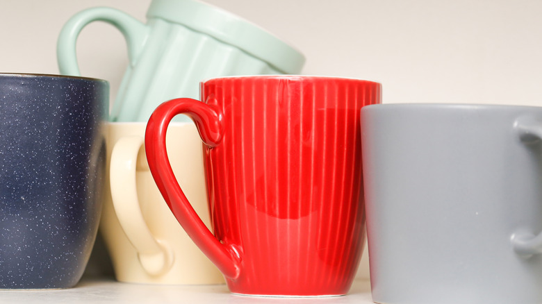 Too Many Coffee Mugs? This Simple Storage Fix Keeps Extras Safe, Tidy ...