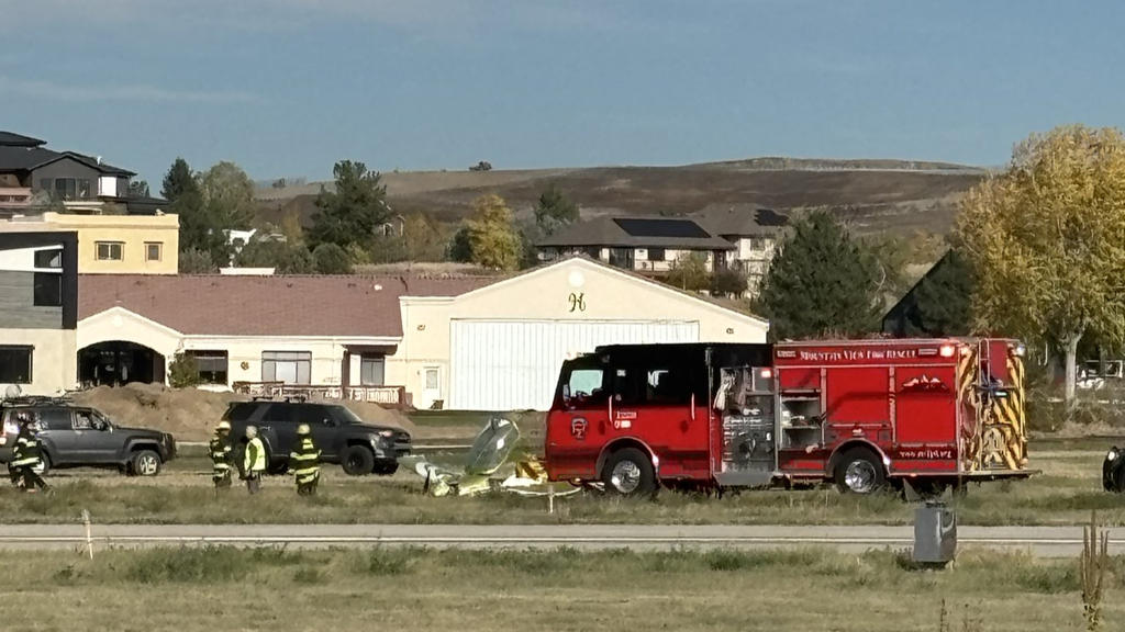 Family says "unexpected wind shear" caused fatal Colorado plane crash