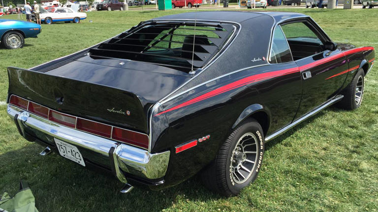 Why did muscle cars come with rear window slats?