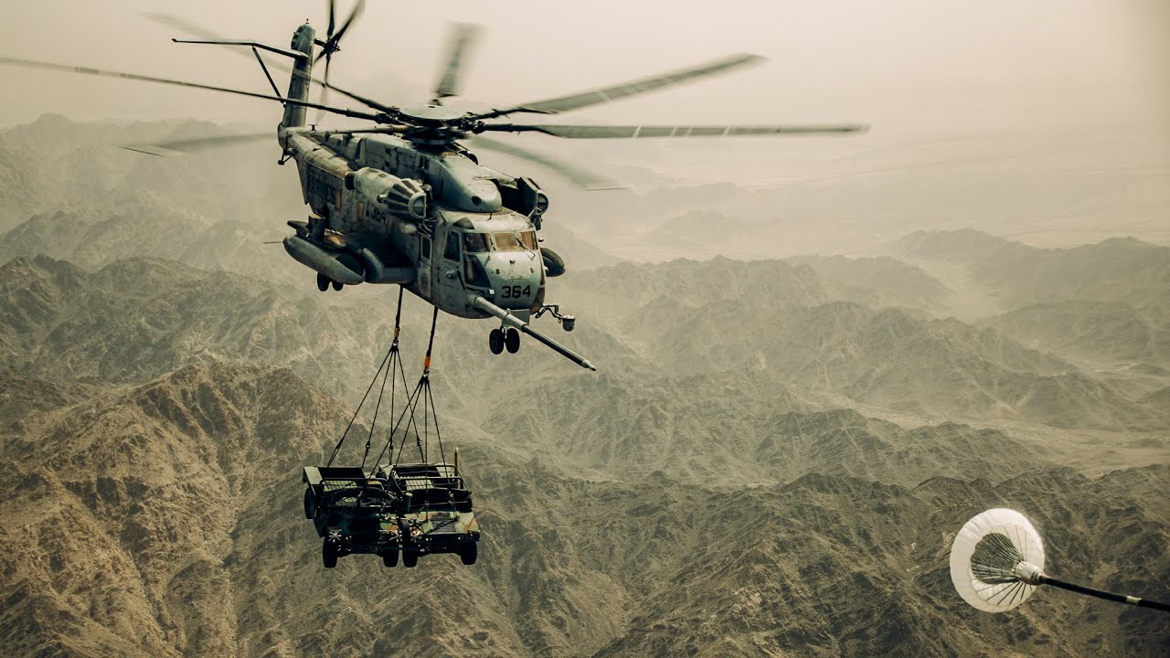 Helicopter lifting tons gets refuelled mid-air