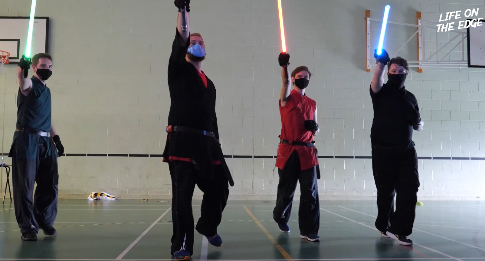 Star Wars fans take part in Lightsaber combat training.