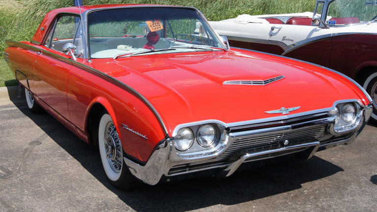 Why did old cars use hidden fuel filler doors?