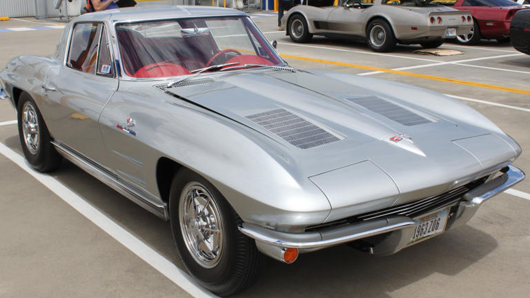 Why did old cars use hidden fuel filler doors?