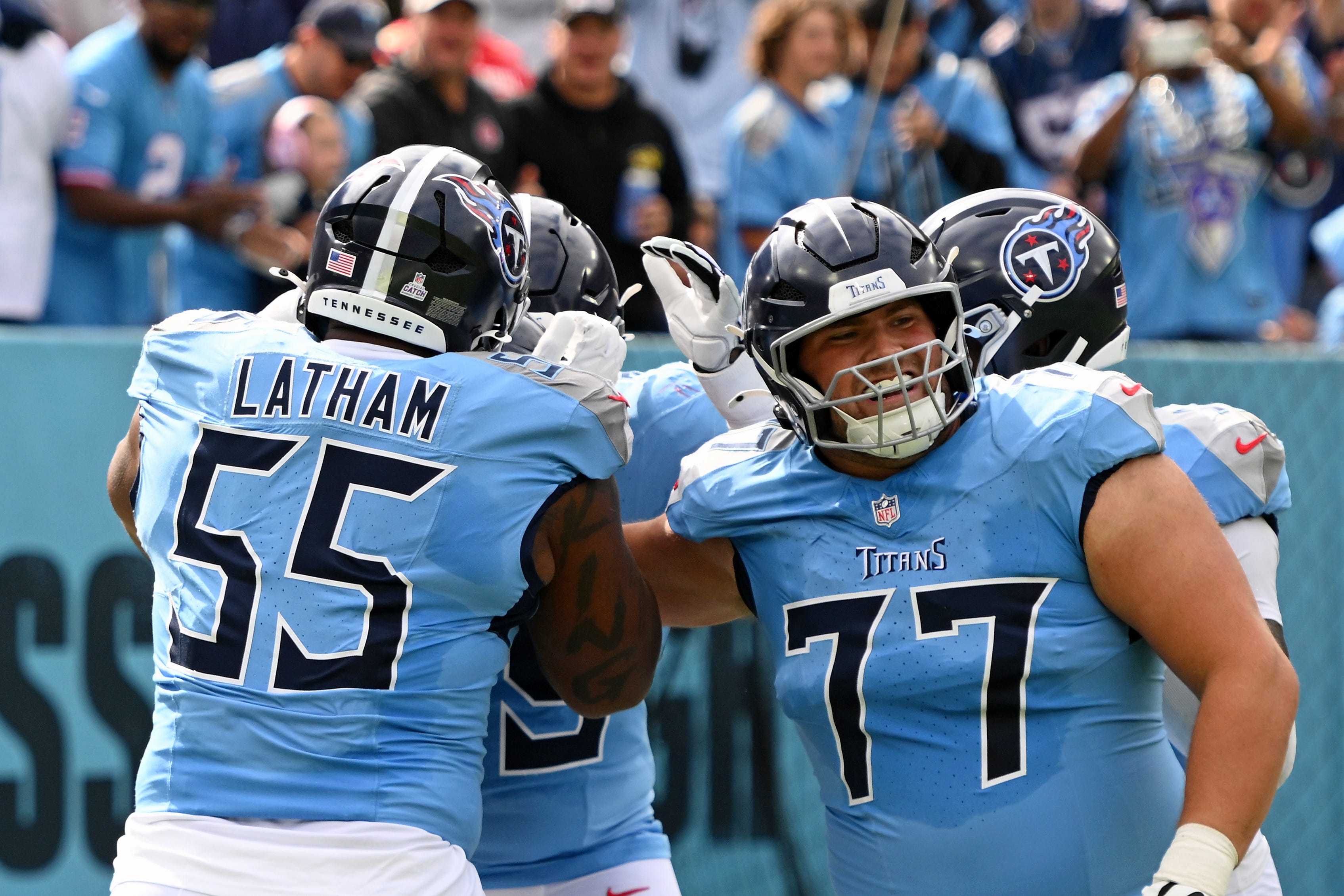 Who was the Tennessee Titans' highest graded player in Week 15 loss?