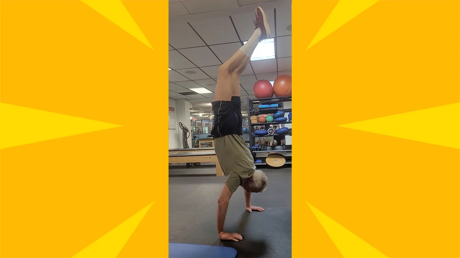 Oldest person to do a handstand - Paul Budline at 74 years and 145 days old