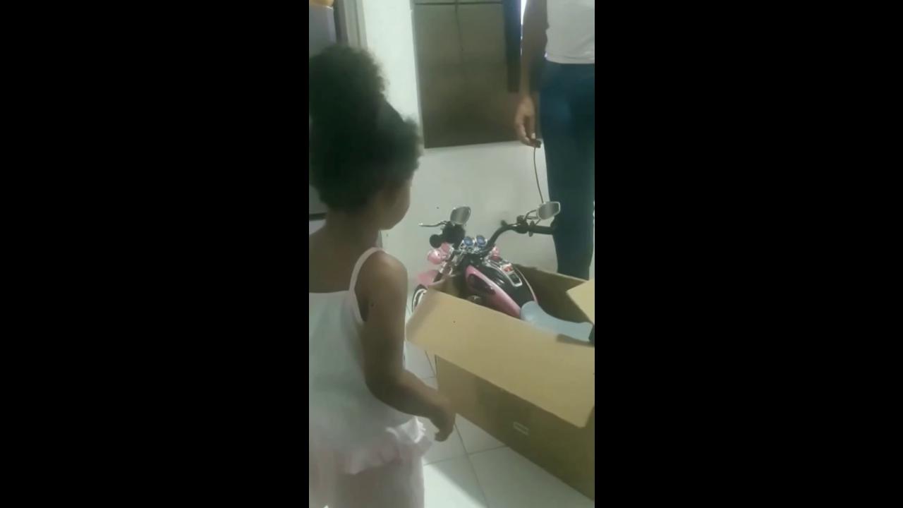 Daughter Chooses Cardboard Box Over Motorcycle