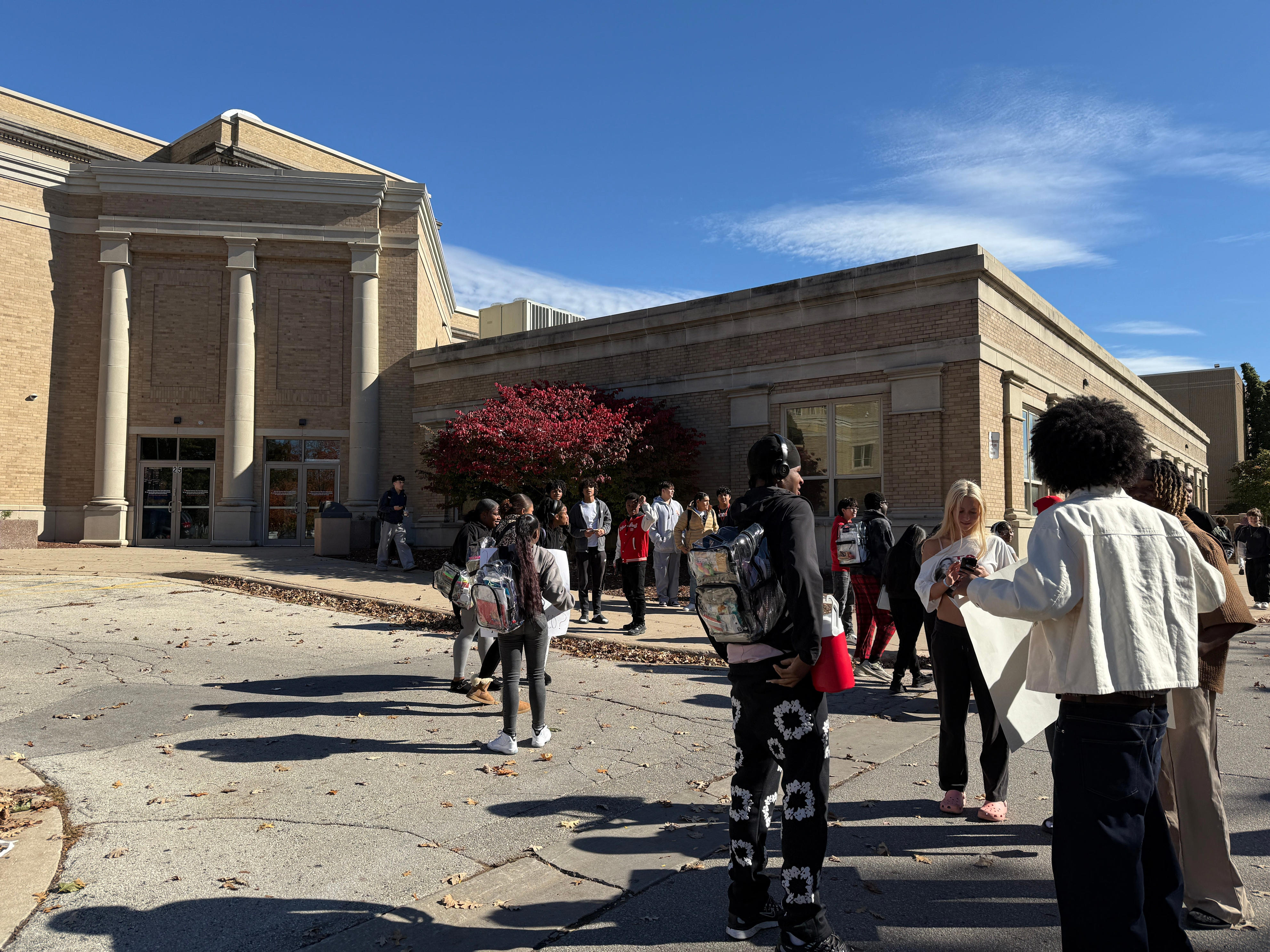 Some Green Bay East students walk out to protest football coach ...